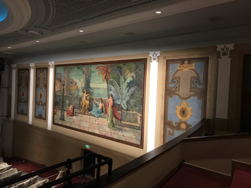 Construction crew unearths hidden murals while renovating local theater ...